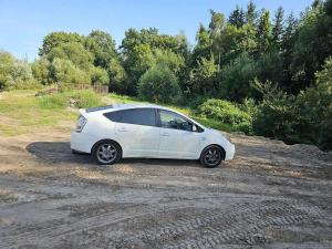 White Toyota Prius 2006 in Kaunas, with an engine capacity of 1.50 L and mileage of 399 thousand km for 1650 €, photo 7 on AUTOMOTO.COM.LV