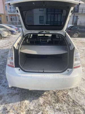 White Toyota Prius 2010 in Vilnius, with an engine capacity of 1.80 L and mileage of 275 thousand km for 8990 €, photo 18 on AUTOMOTO.COM.LV