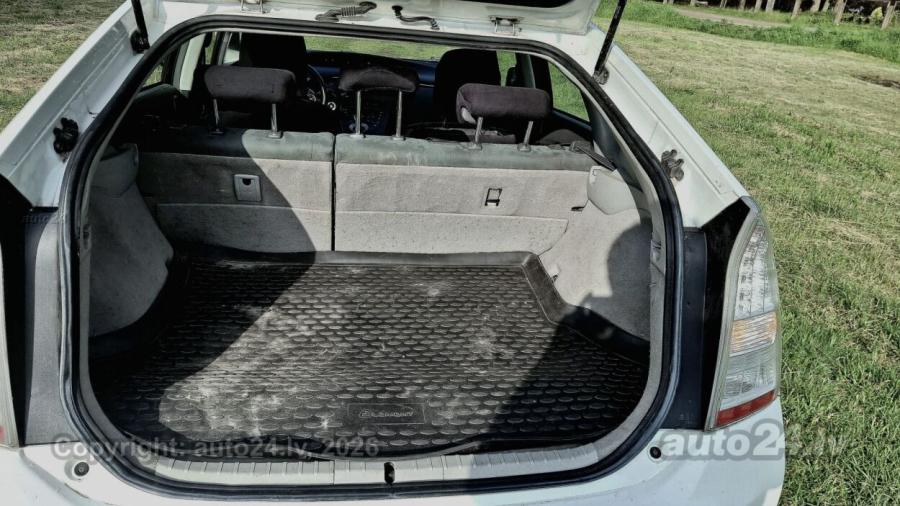 Balts Toyota Prius 2012 Rīga, ar dzinēja tilpumu 1.80 L un nobraukumu 350 tūkst. km par 5000 €, foto 10 vietnē AUTOMOTO.COM.LV