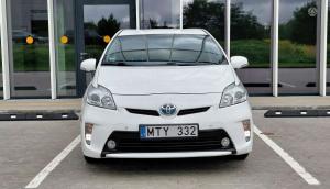 White Toyota Prius 2012 in Vilnius, with an engine capacity of 1.80 L and mileage of 105 thousand km for 9700 €, photo 4 on AUTOMOTO.COM.LV