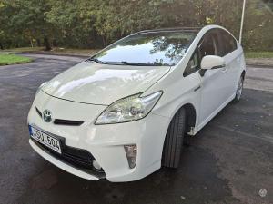 White Toyota Prius 2013 in Vilnius, with an engine capacity of 1.80 L and mileage of 218 thousand km for 8900 €, photo  on AUTOMOTO.COM.LV