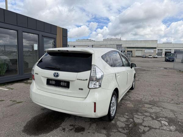 White Toyota Prius 2013 in Panevezys, with an engine capacity of 1.80 L and mileage of 370 thousand km for 7000 €, photo 8 on AUTOMOTO.COM.LV