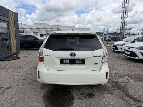 White Toyota Prius 2013 in Panevezys, with an engine capacity of 1.80 L and mileage of 370 thousand km for 7000 €, photo 9 on AUTOMOTO.COM.LV