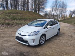 White Toyota Prius 2014 in Kaunas, with an engine capacity of 1.80 L and mileage of 243 thousand km for 8500 €, photo  on AUTOMOTO.COM.LV