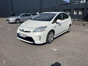White Toyota Prius 2015 in Vilnius, with an engine capacity of 1.80 L and mileage of 255 thousand km for 5990 €, photo  on AUTOMOTO.COM.LV