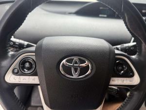 White Toyota Prius 2017 in Siauliai, with an engine capacity of 1.80 L and mileage of 250 thousand km for 9200 €, photo 19 on AUTOMOTO.COM.LV