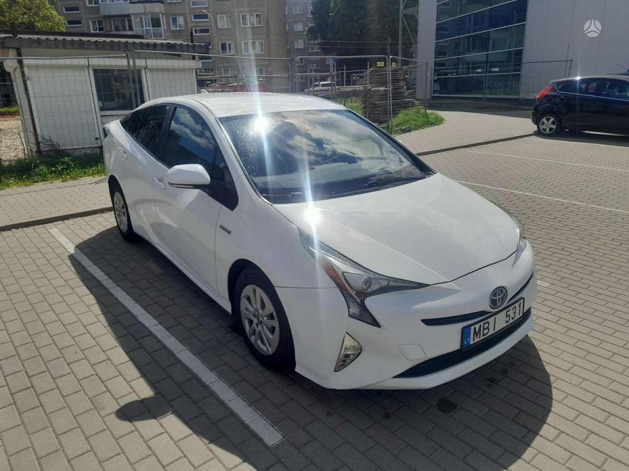 Белый Тойота Приус 2017 в Каунас, объемом двигателя 1.80 л и пробегом 324 тыс. км за 9500 €, фото 20 на AUTOMOTO.COM.LV