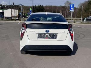 White Toyota Prius 2018 in Vilnius, with an engine capacity of 1.80 L and mileage of 226 thousand km for 11950 €, photo  on AUTOMOTO.COM.LV