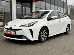 White Toyota Prius 2019 in Vilnius, with an engine capacity of 1.80 L and mileage of 259 thousand km for 11850 €, photo  on AUTOMOTO.COM.LV