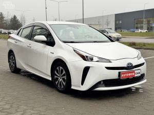 White Toyota Prius 2019 in Vilnius, with an engine capacity of 1.80 L and mileage of 259 thousand km for 11850 €, photo 5 on AUTOMOTO.COM.LV