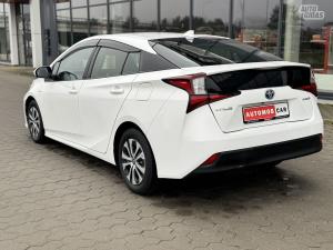 White Toyota Prius 2019 in Vilnius, with an engine capacity of 1.80 L and mileage of 259 thousand km for 11850 €, photo 7 on AUTOMOTO.COM.LV