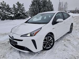 White Toyota Prius 2020 in Panevezys, with an engine capacity of 1.80 L and mileage of 42 thousand km for 15900 €, photo  on AUTOMOTO.COM.LV
