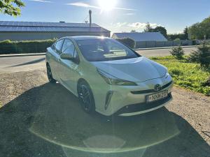 White Toyota Prius 2022 in Kaunas, with an engine capacity of 1.80 L and mileage of 27 thousand km for 16700 €, photo 6 on AUTOMOTO.COM.LV