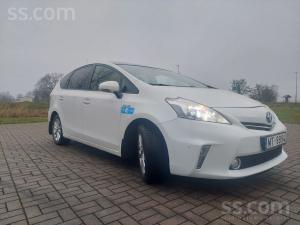 White Toyota Prius 2013 in Liepaja, with an engine capacity of 1.80 L and mileage of 797 thousand km for 6000 €, photo 3 on AUTOMOTO.COM.LV