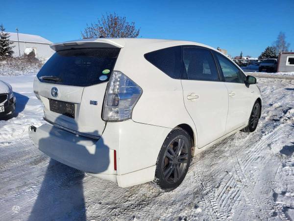 White Toyota Prius 2013 in Alytus, with an engine capacity of 1.80 L and mileage of 340 thousand km for 5350 €, photo 2 on AUTOMOTO.COM.LV