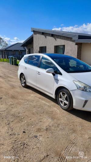 White Toyota Prius 2013 in Kaunas, with an engine capacity of 1.80 L and mileage of 745 thousand km for 6200 €, photo 4 on AUTOMOTO.COM.LV