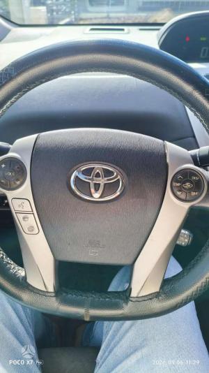 White Toyota Prius 2013 in Kaunas, with an engine capacity of 1.80 L and mileage of 745 thousand km for 6200 €, photo 9 on AUTOMOTO.COM.LV