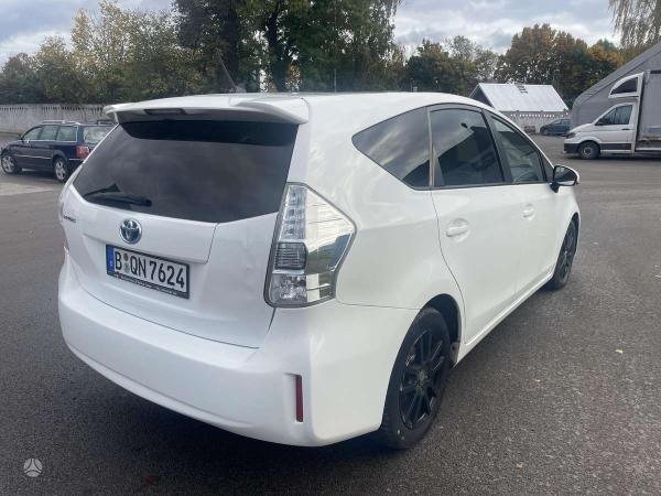 White Toyota Prius 2014 in Panevezys, with an engine capacity of 1.80 L and mileage of 260 thousand km for 8000 €, photo 6 on AUTOMOTO.COM.LV