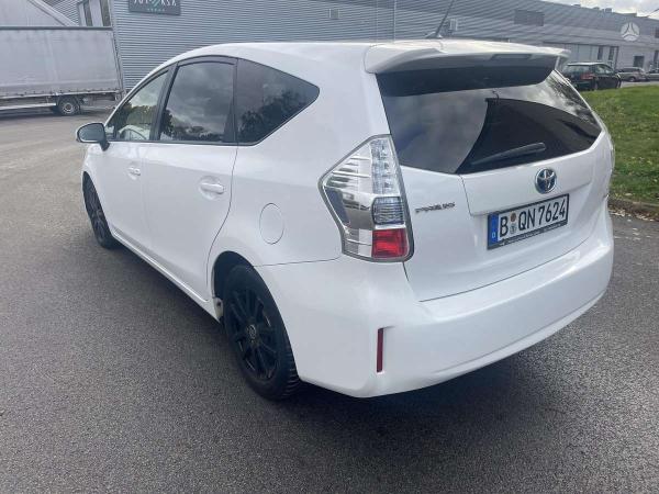 White Toyota Prius 2014 in Panevezys, with an engine capacity of 1.80 L and mileage of 260 thousand km for 8000 €, photo 8 on AUTOMOTO.COM.LV