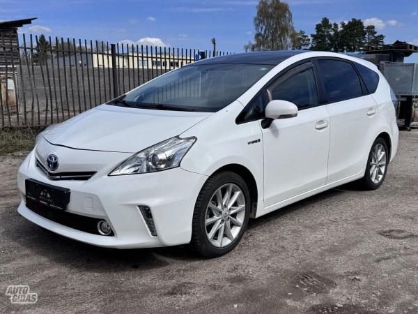 White Toyota Prius 2015 in Vilnius, with an engine capacity of 1.80 L and mileage of 407 thousand km for 7950 €, photo 1 on AUTOMOTO.COM.LV