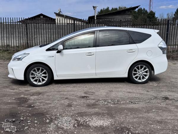 White Toyota Prius 2015 in Vilnius, with an engine capacity of 1.80 L and mileage of 407 thousand km for 7950 €, photo 2 on AUTOMOTO.COM.LV