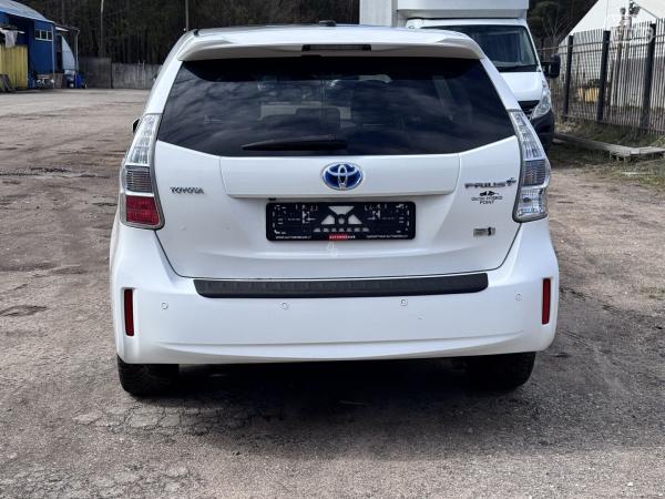 White Toyota Prius 2015 in Vilnius, with an engine capacity of 1.80 L and mileage of 407 thousand km for 7950 €, photo 4 on AUTOMOTO.COM.LV