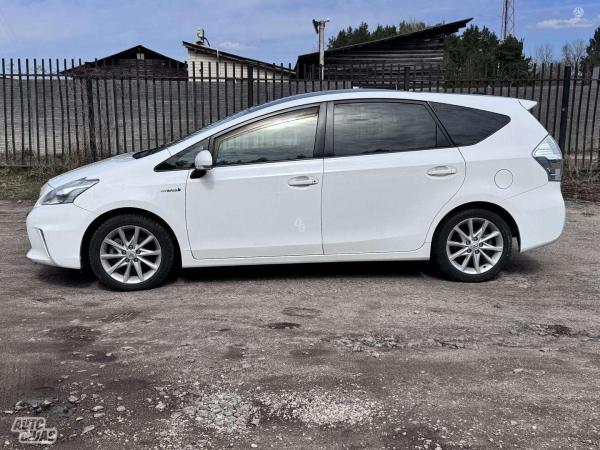 White Toyota Prius 2015 in Vilnius, with an engine capacity of 1.80 L and mileage of 407 thousand km for 7950 €, photo 5 on AUTOMOTO.COM.LV