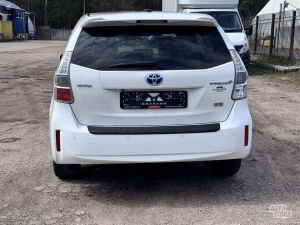 White Toyota Prius 2015 in Vilnius, with an engine capacity of 1.80 L and mileage of 407 thousand km for 7950 €, photo 7 on AUTOMOTO.COM.LV