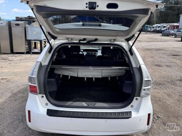 White Toyota Prius 2015 in Vilnius, with an engine capacity of 1.80 L and mileage of 407 thousand km for 7950 €, photo 9 on AUTOMOTO.COM.LV