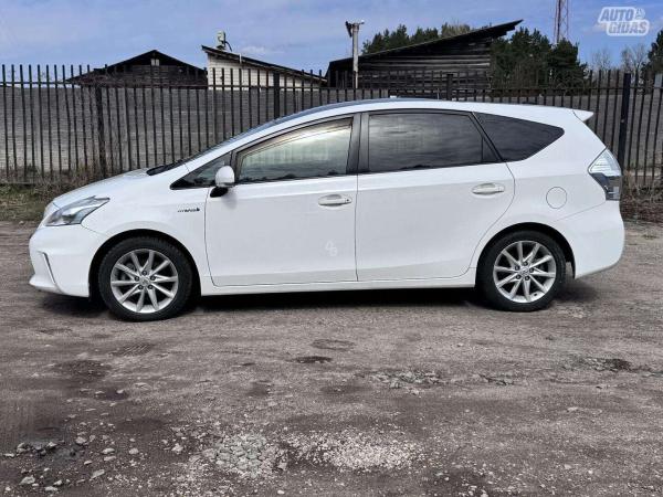 White Toyota Prius 2015 in Vilnius, with an engine capacity of 1.80 L and mileage of 407 thousand km for 7950 €, photo 5 on AUTOMOTO.COM.LV
