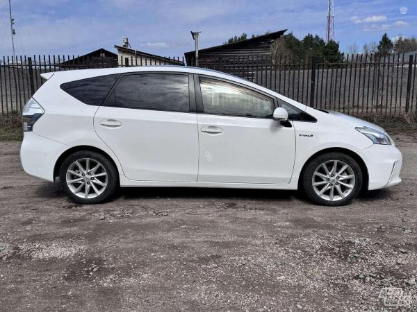 White Toyota Prius 2015 in Vilnius, with an engine capacity of 1.80 L and mileage of 407 thousand km for 7950 €, photo 8 on AUTOMOTO.COM.LV