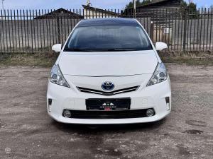 White Toyota Prius 2015 in Vilnius, with an engine capacity of 1.80 L and mileage of 407 thousand km for 7220 €, photo 4 on AUTOMOTO.COM.LV