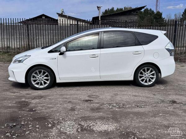 White Toyota Prius 2015 in Vilnius, with an engine capacity of 1.80 L and mileage of 407 thousand km for 7220 €, photo 5 on AUTOMOTO.COM.LV