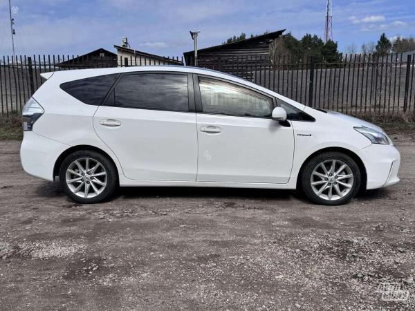White Toyota Prius 2015 in Vilnius, with an engine capacity of 1.80 L and mileage of 407 thousand km for 7220 €, photo 8 on AUTOMOTO.COM.LV