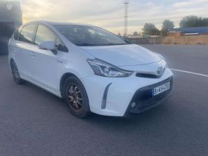 Белый Тойота Приус 2015 в Паневежис, объемом двигателя 1.80 л и пробегом 250 тыс. км за 9200 €, фото 4 на AUTOMOTO.COM.LV