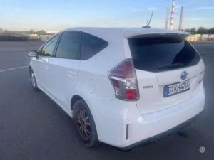 Белый Тойота Приус 2015 в Паневежис, объемом двигателя 1.80 л и пробегом 250 тыс. км за 9200 €, фото 8 на AUTOMOTO.COM.LV