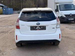 White Toyota Prius 2016 in Vilnius, with an engine capacity of 1.80 L and mileage of 488 thousand km for 8950 €, photo 7 on AUTOMOTO.COM.LV