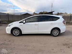 White Toyota Prius 2016 in Vilnius, with an engine capacity of 1.80 L and mileage of 488 thousand km for 8950 €, photo 10 on AUTOMOTO.COM.LV