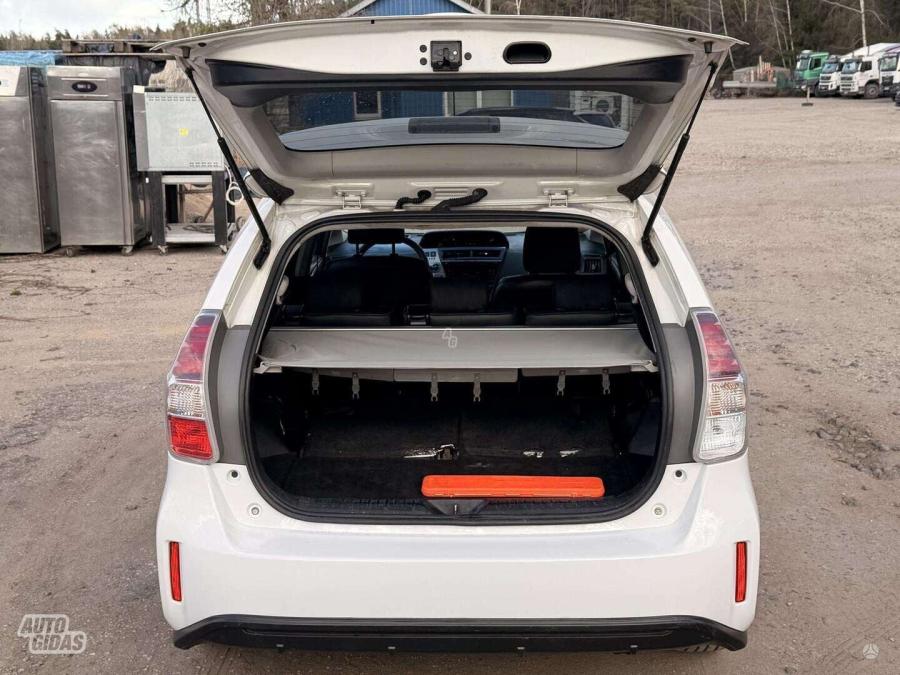 White Toyota Prius 2016 in Vilnius, with an engine capacity of 1.80 L and mileage of 488 thousand km for 8950 €, photo 12 on AUTOMOTO.COM.LV