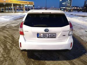 White Toyota Prius 2017 in Vilnius, with an engine capacity of 1.80 L and mileage of 220 thousand km for 10990 €, photo 5 on AUTOMOTO.COM.LV