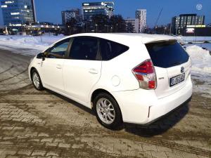White Toyota Prius 2017 in Vilnius, with an engine capacity of 1.80 L and mileage of 220 thousand km for 10990 €, photo 6 on AUTOMOTO.COM.LV