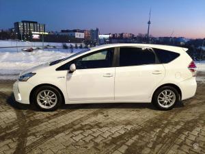 White Toyota Prius 2017 in Vilnius, with an engine capacity of 1.80 L and mileage of 220 thousand km for 10990 €, photo 7 on AUTOMOTO.COM.LV
