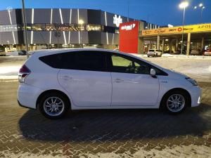 White Toyota Prius 2017 in Vilnius, with an engine capacity of 1.80 L and mileage of 220 thousand km for 10990 €, photo 8 on AUTOMOTO.COM.LV
