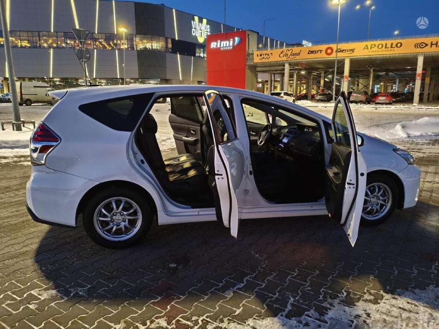 White Toyota Prius 2017 in Vilnius, with an engine capacity of 1.80 L and mileage of 220 thousand km for 10990 €, photo 10 on AUTOMOTO.COM.LV