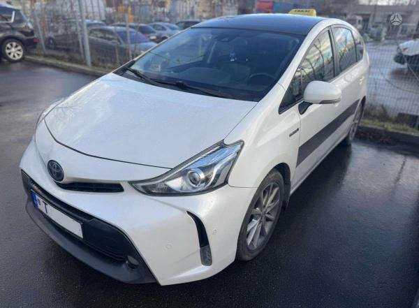 White Toyota Prius 2018 in Klaipeda, with an engine capacity of 1.80 L and mileage of 170 thousand km for 14000 €, photo 1 on AUTOMOTO.COM.LV