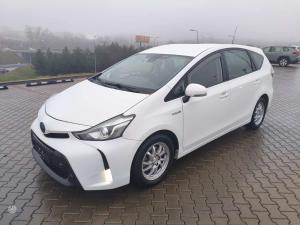 White Toyota Prius 2019 in Vilnius, with an engine capacity of 1.80 L and mileage of 215 thousand km for 12490 €, photo  on AUTOMOTO.COM.LV
