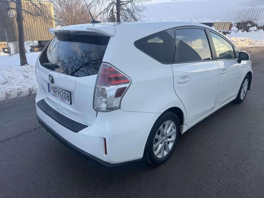 White Toyota Prius 2019 in Klaipeda, with an engine capacity of 1.80 L and mileage of 245 thousand km for 11300 €, photo 2 on AUTOMOTO.COM.LV