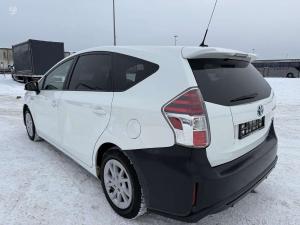 White Toyota Prius 2019 in Vilnius, with an engine capacity of 1.80 L and mileage of 261 thousand km for 8800 €, photo 3 on AUTOMOTO.COM.LV