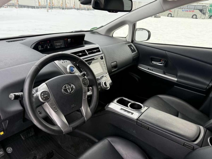 White Toyota Prius 2019 in Vilnius, with an engine capacity of 1.80 L and mileage of 261 thousand km for 8800 €, photo 15 on AUTOMOTO.COM.LV