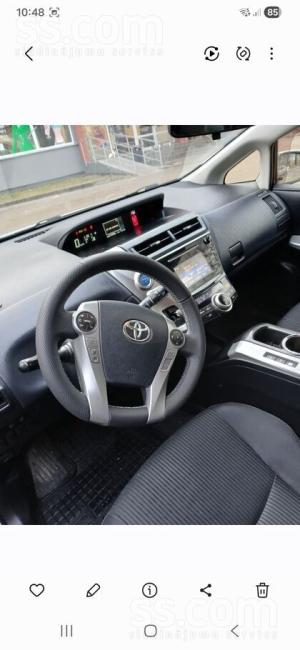 White Toyota Prius 2019 in Riga, with an engine capacity of 1.80 L and mileage of 320 thousand km for 12900 €, photo 10 on AUTOMOTO.COM.LV